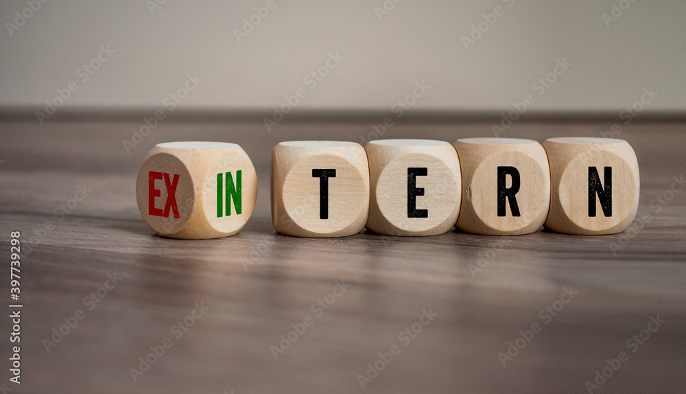 Cubes, dice or blocks showing the german words for external and ...