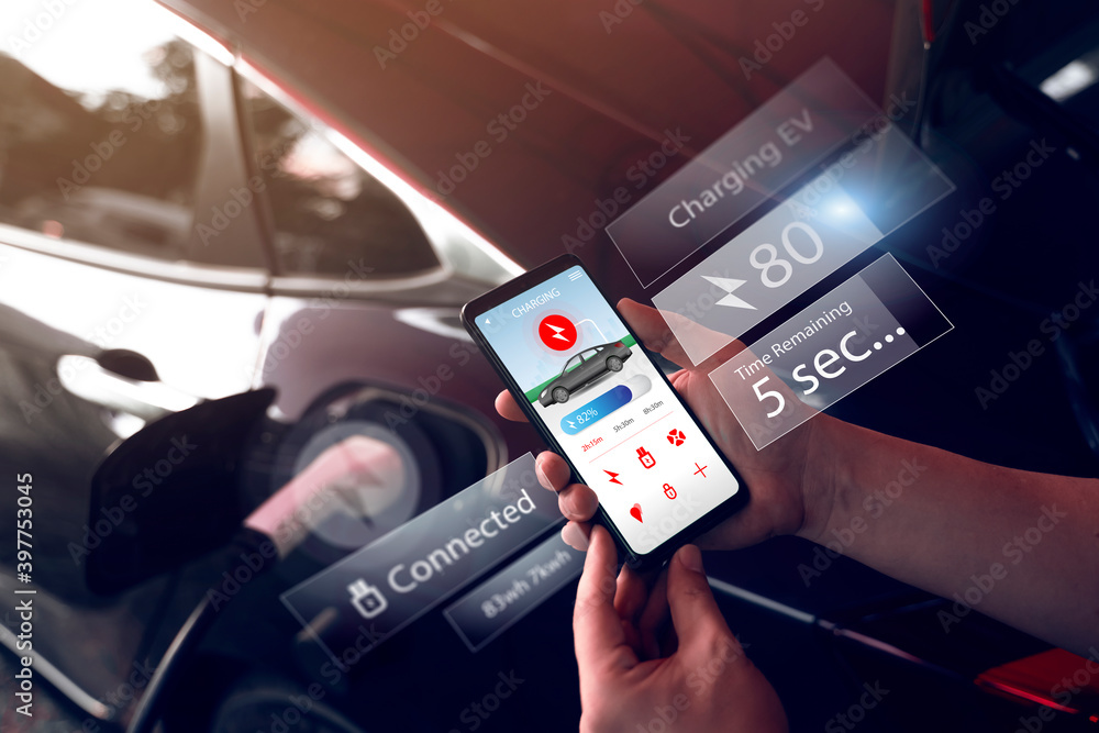 Using mobile smartphone device refueling electric vehicle EV car mock ...