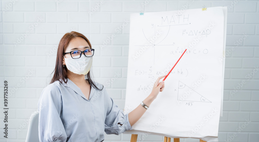 Asian woman teacher professor wearing facemask safety pandemic teaching ...