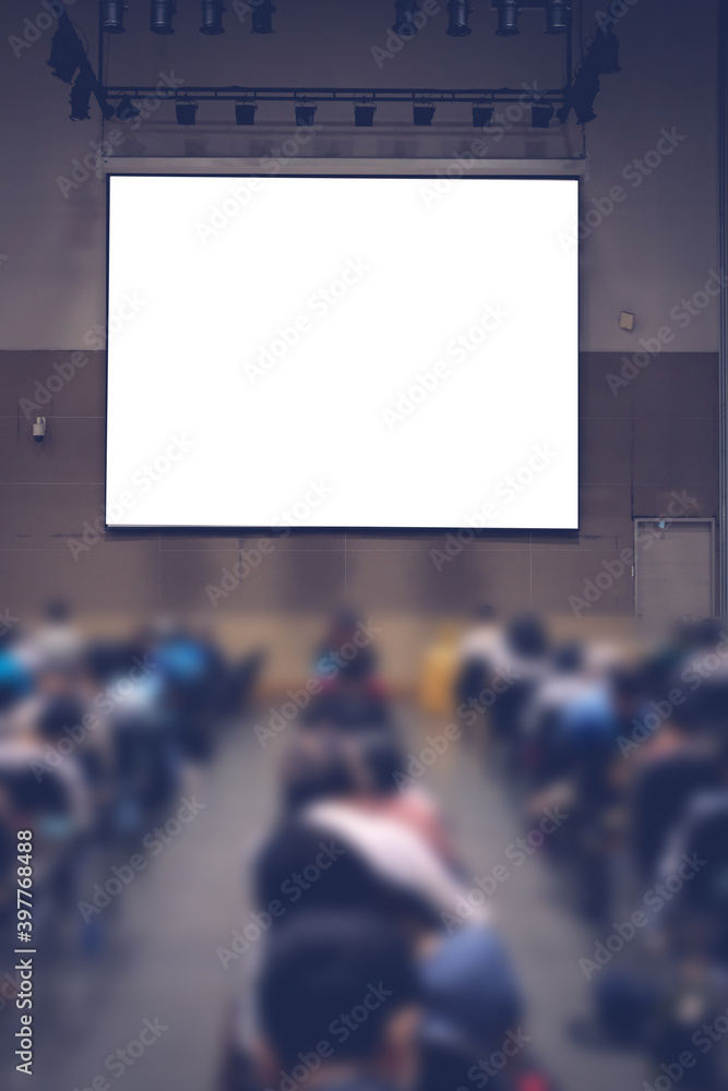 stage & presentation screen in seminar conference room. blurry ...
