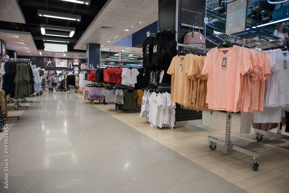 Foto de Interior inside shop store display of fashion clothing do Stock ...