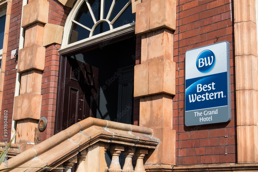 Entrance to Best Western The Grand Hotel showing open door, sign ...
