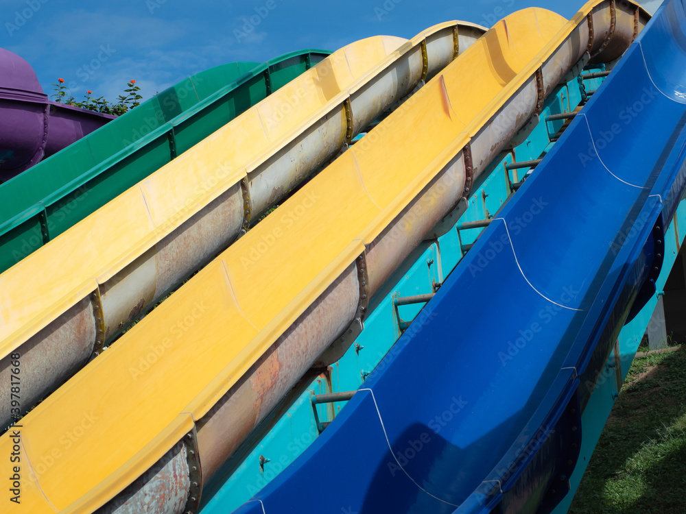 Colorful plastic water-slide in swimming pool or water park. Stock ...