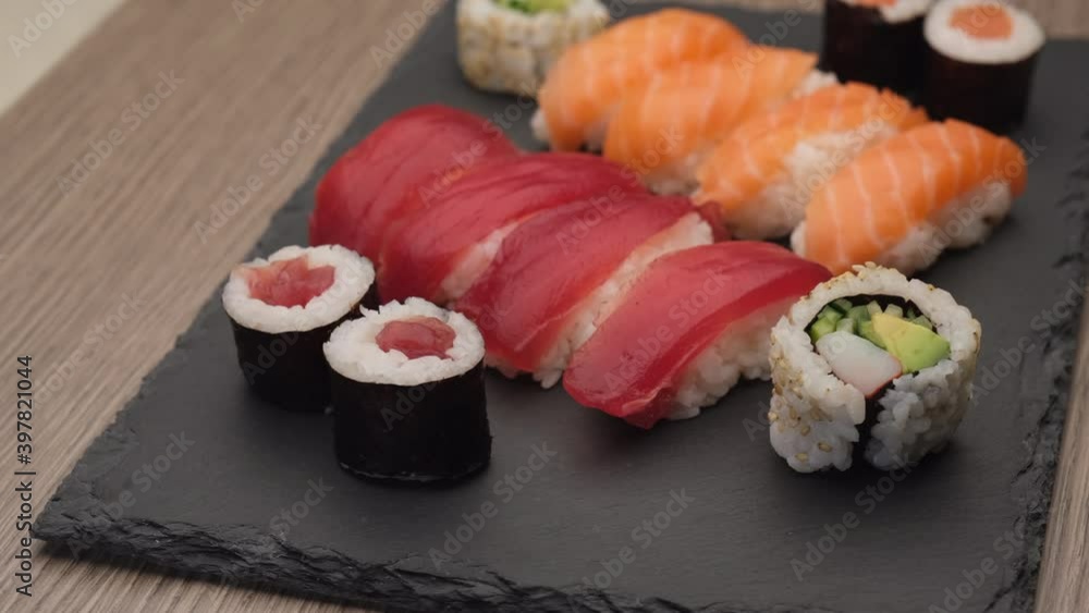 Sushi assortment with nigiri salmon, nigiri tuna, hosomaki and uramaki ...