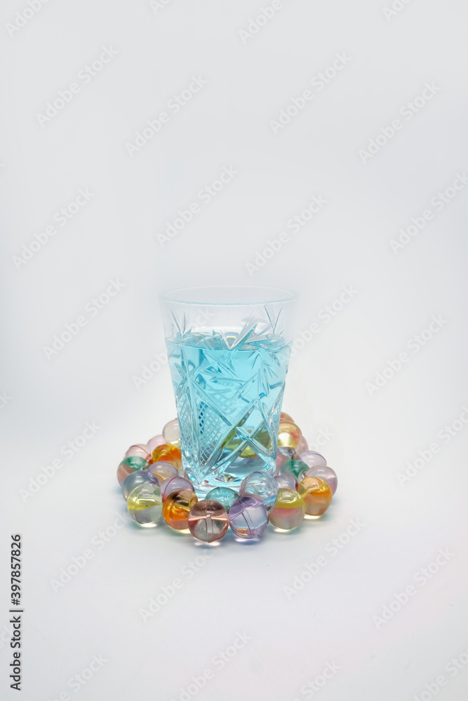 blue alcoholic drink in a decanter. Cocktail with blue gin , tonic ...