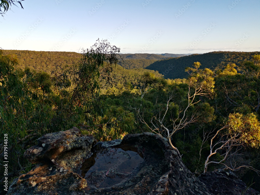 Breathtaking view of mountain and valley landscape on a clear blue sky ...