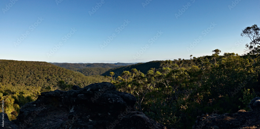 Breathtaking panoramic view of mountain and valley landscape on a clear ...