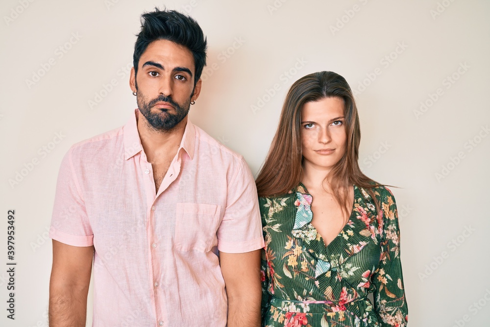 Beautiful young couple of boyfriend and girlfriend together depressed ...