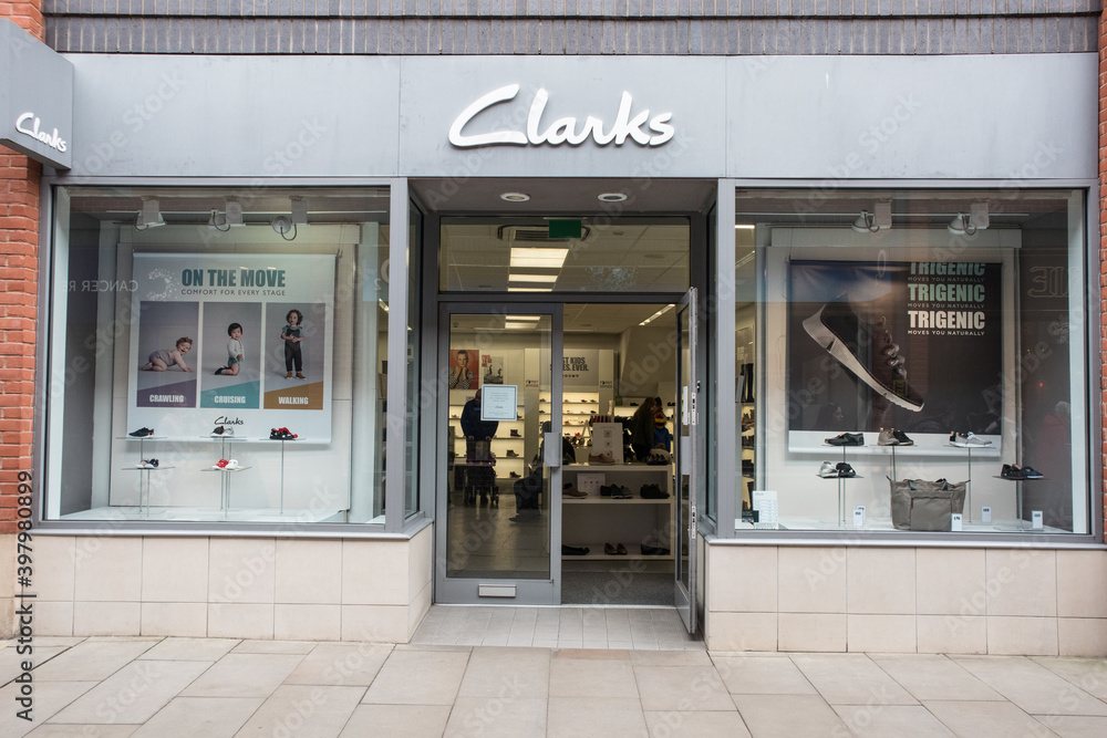 Entrance to Clarks Footware shoe store shop showing logo, sign, signage ...