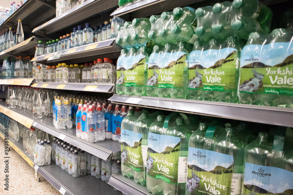 Supermarket display of bottled water in plastic bottles Stock Photo ...
