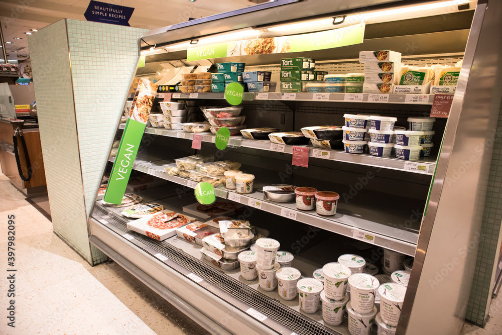 Chilled vegan food on display in a supermarket chiller Stock Photo ...