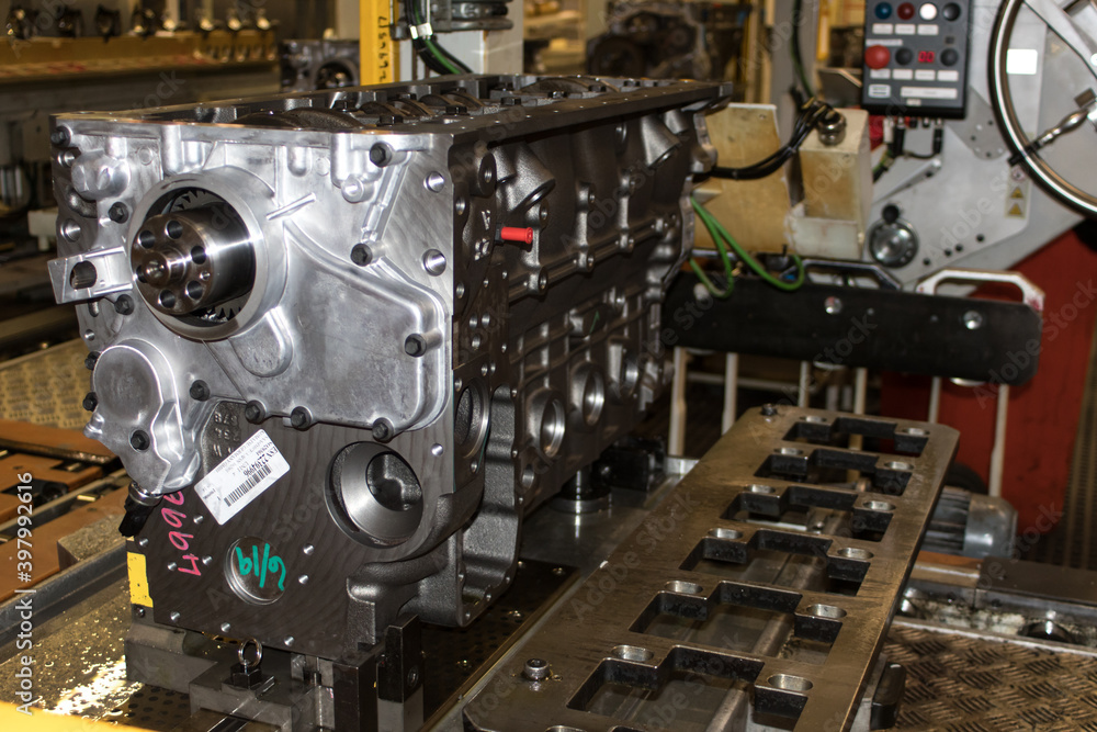 Combustion engine on a production line in a factory setting during ...