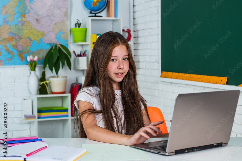 Pupil kid study at school in workplace classroom, learning Stock Photo ...