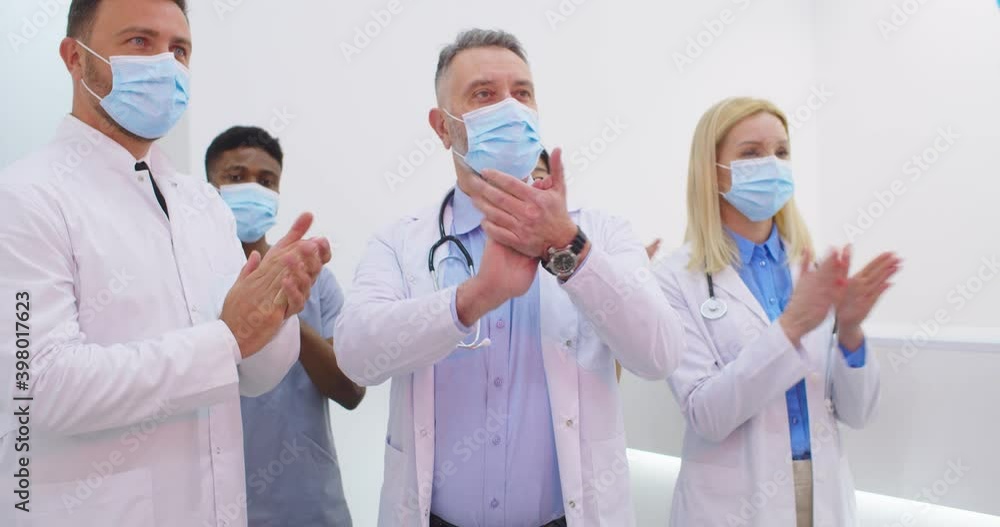 Vidéo Stock Mixed-races doctors and nurses medical professional team in ...