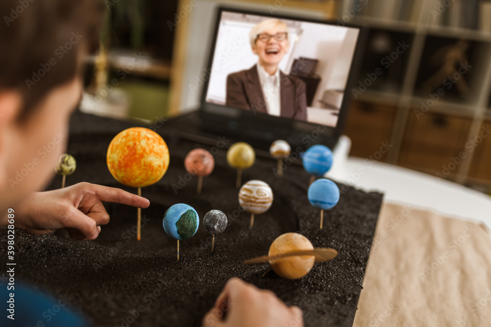 Kid presenting his science home project - the planets of our solar ...