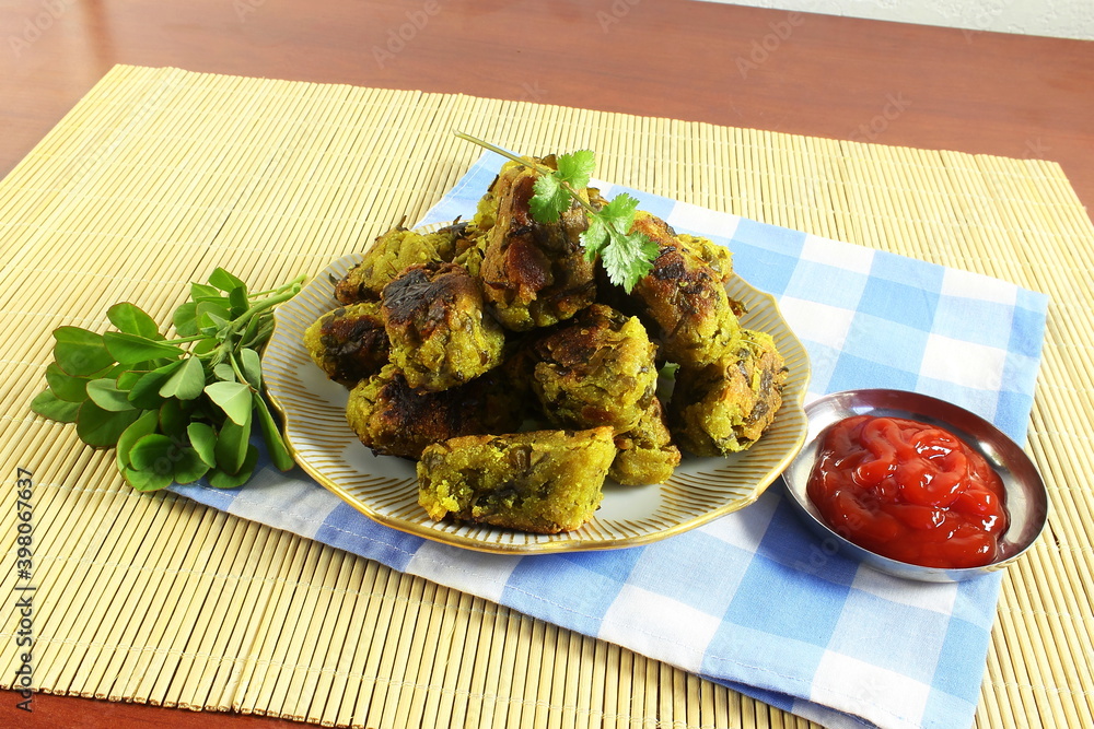 traditional indian gujarati snack spicy methi muthiya or muthia Stock ...