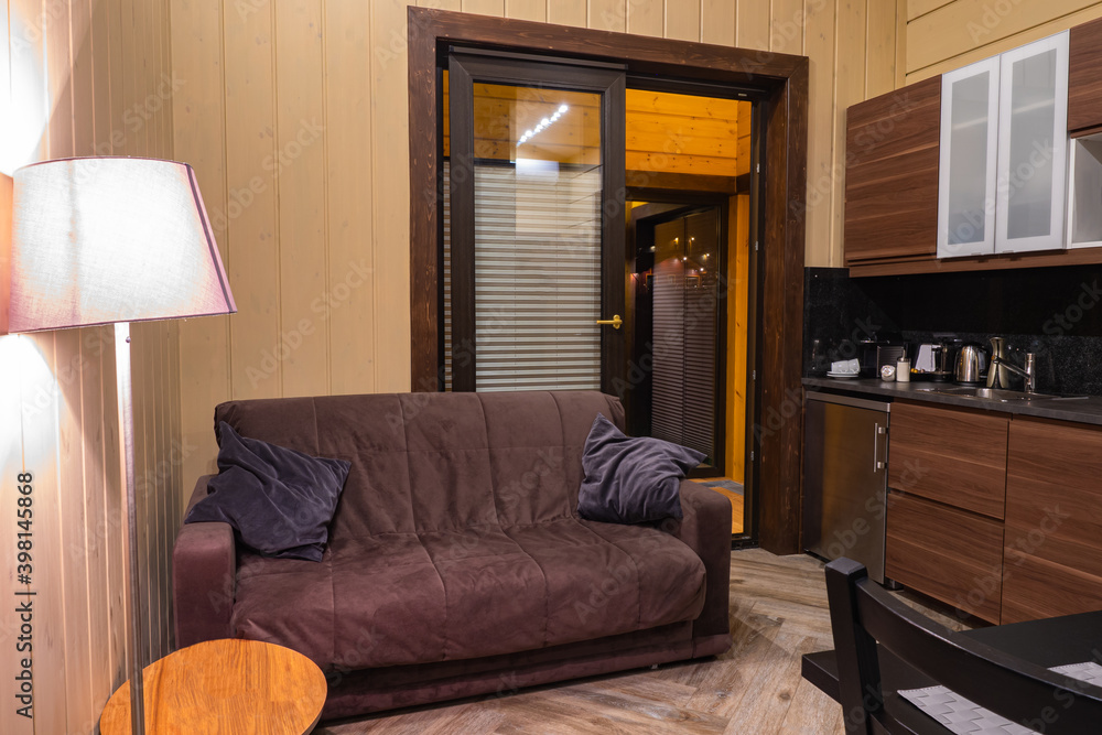 Small room with a sofa and kitchen set. Interior living room and ...