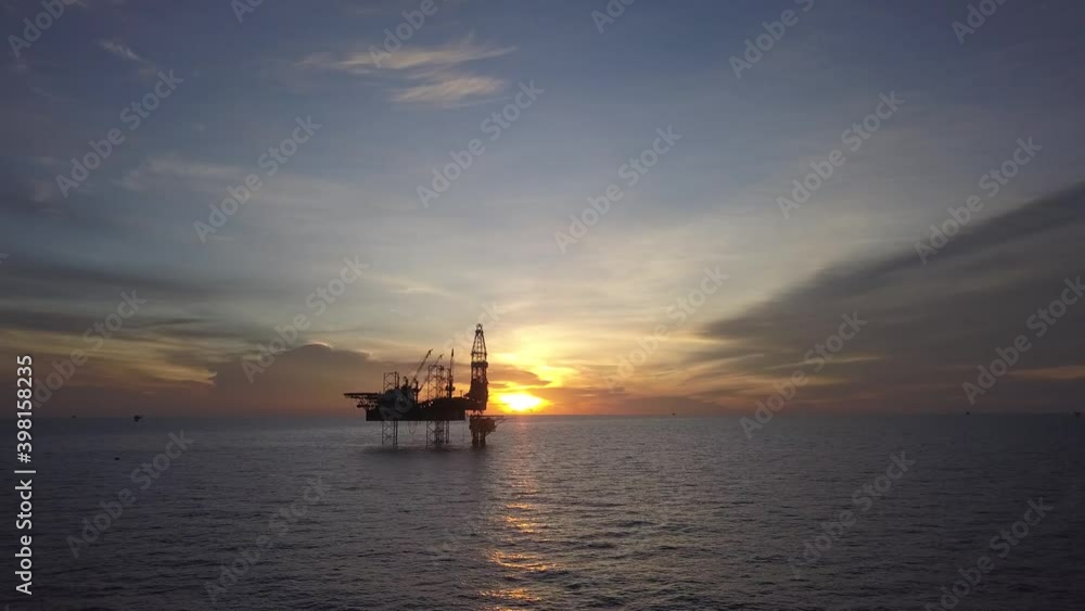 A drone shot of the offshore jack up rig in the middle of the ocean ...