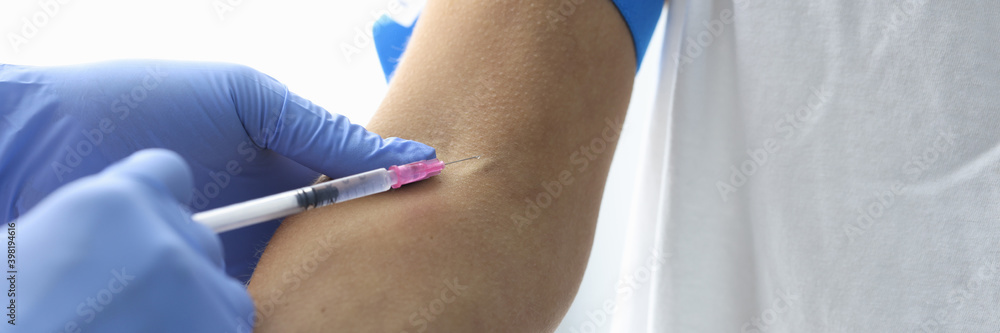 Doctor injects the patient into vein. How to do an intravenous ...
