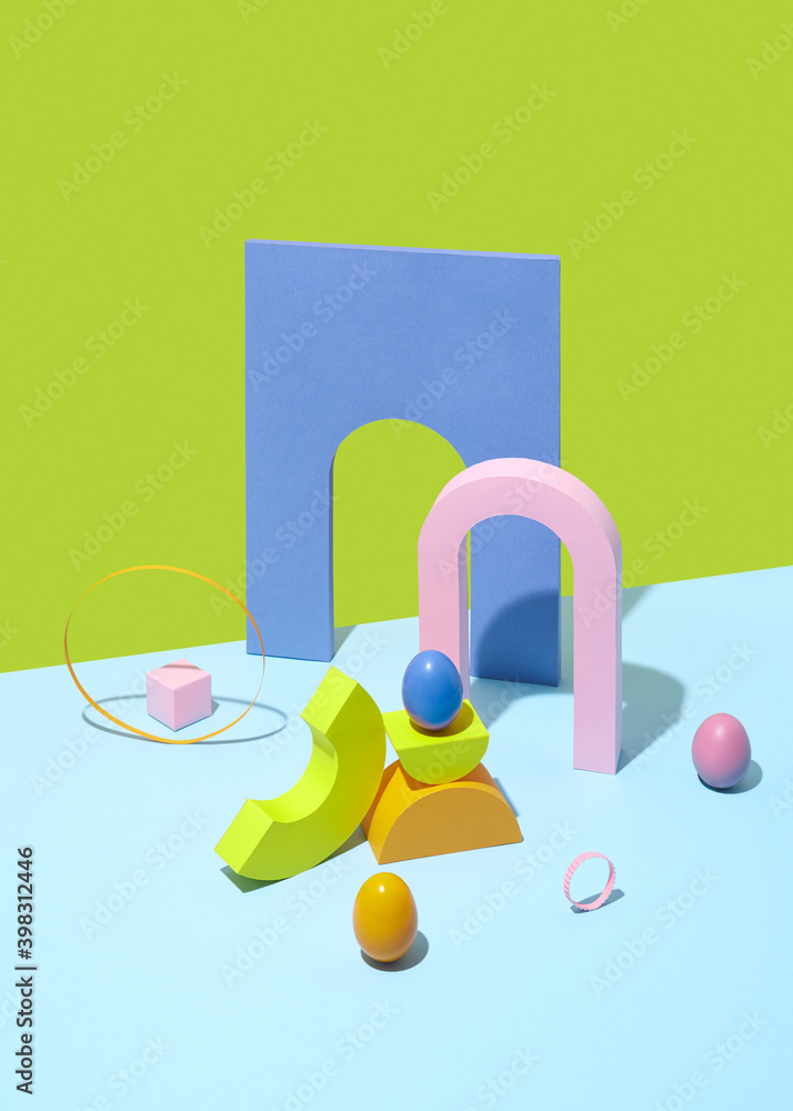 Balancing Easter eggs and papercraft figures. Stock Photo | Adobe Stock