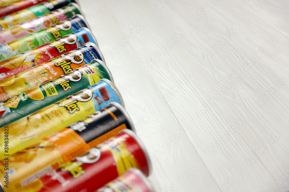 Pringles variety of flavors. Many cardboard tube cans with Pringles ...