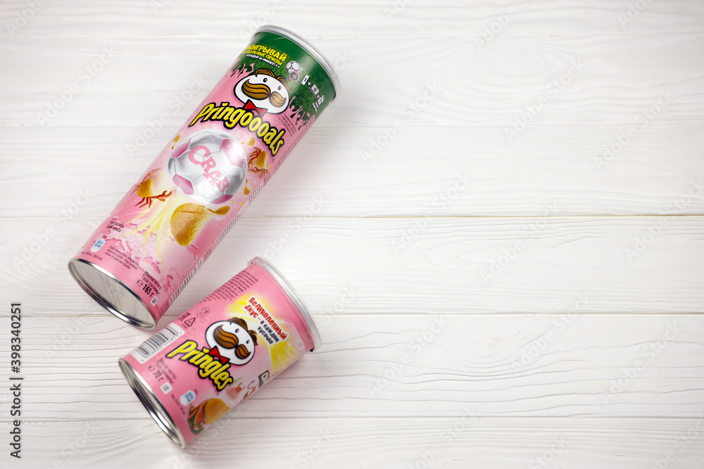 Pringles crab flavour. Cardboard tube cans with Pringles potato chips ...