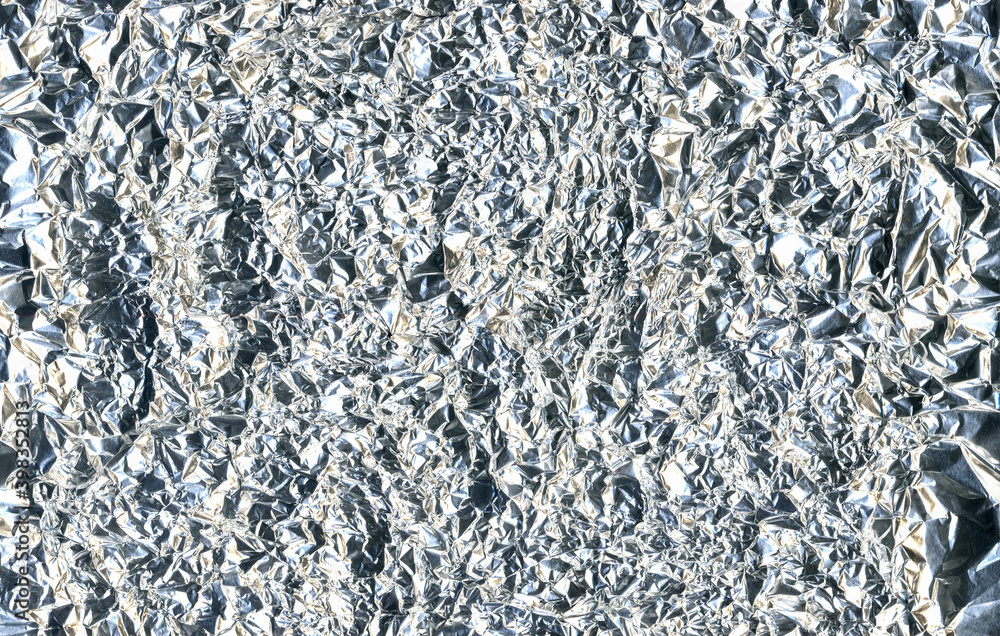 Silver foil background with shiny crumpled surface for texture ...