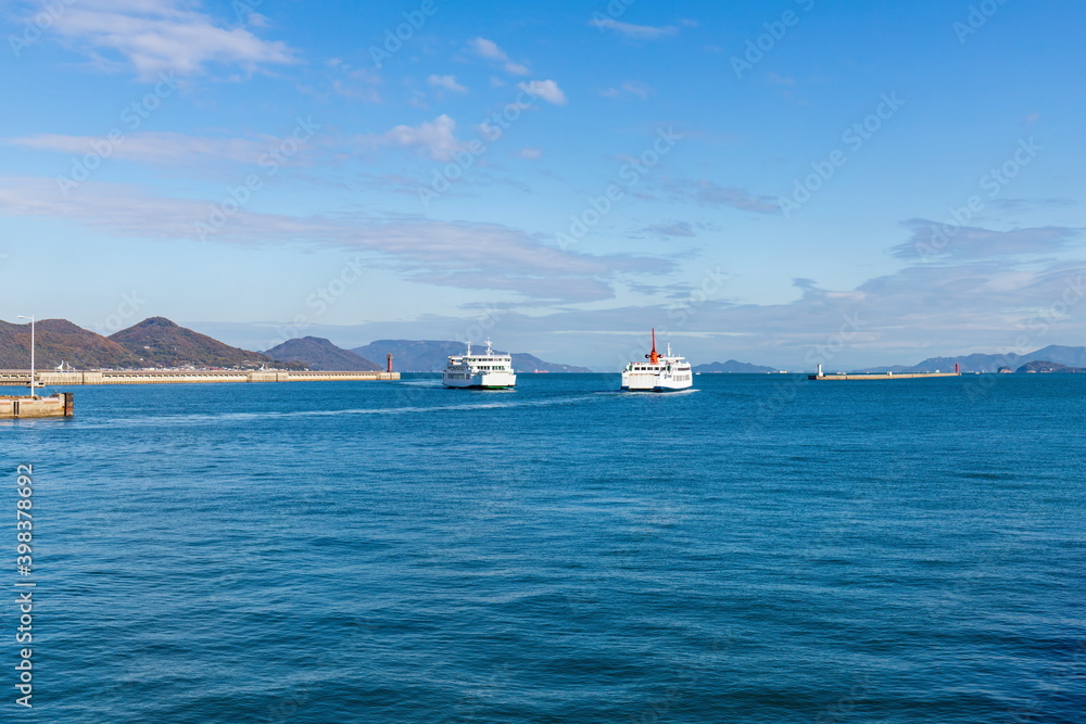 Landscape of Takamatsu port , Ferries arriving and leaving the port ...