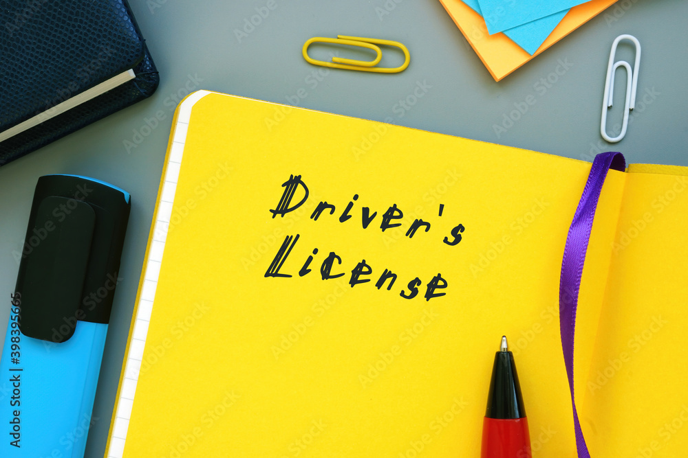 Financial concept about Driver's License with sign on the sheet. Stock ...