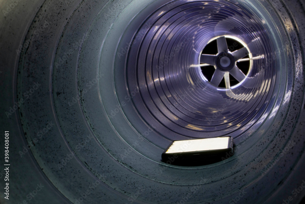 forgotten smartphone in the duct during installation of ventilation ...