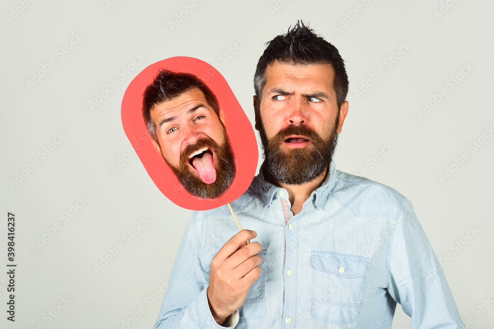 Face expression. Emotions. Advertising. Bearded man holds board with ...
