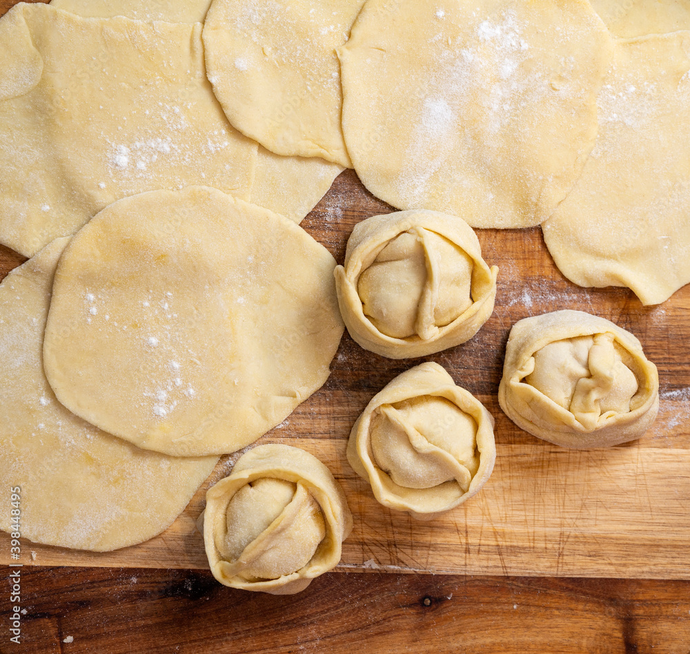Preparation of manti with minced beef meat Stock Photo | Adobe Stock