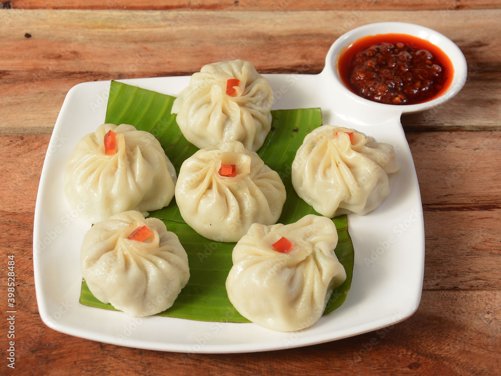 Chicken steam momo. Nepalese Traditional dish Momo stuffed with chicken ...