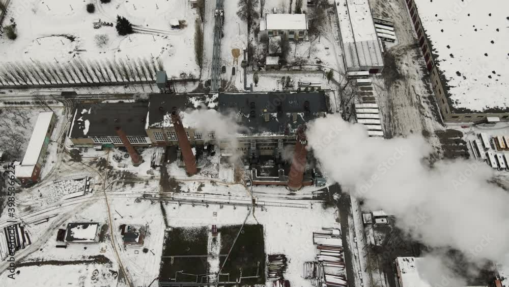 Aerial view of post-apocalyptic view of the territory of a plant with ...