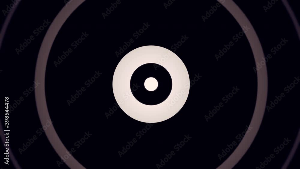 Optical art monochromatic 4k animation of concentric white circles getting bigger on black ...
