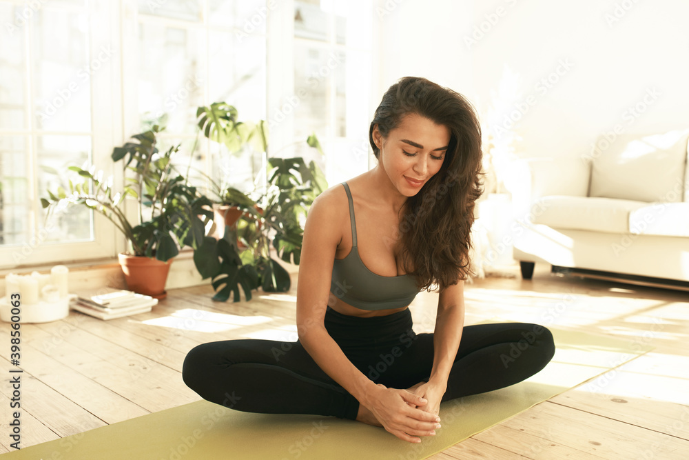 Cute active Arabic girl with long dark hair and slim body sitting on ...