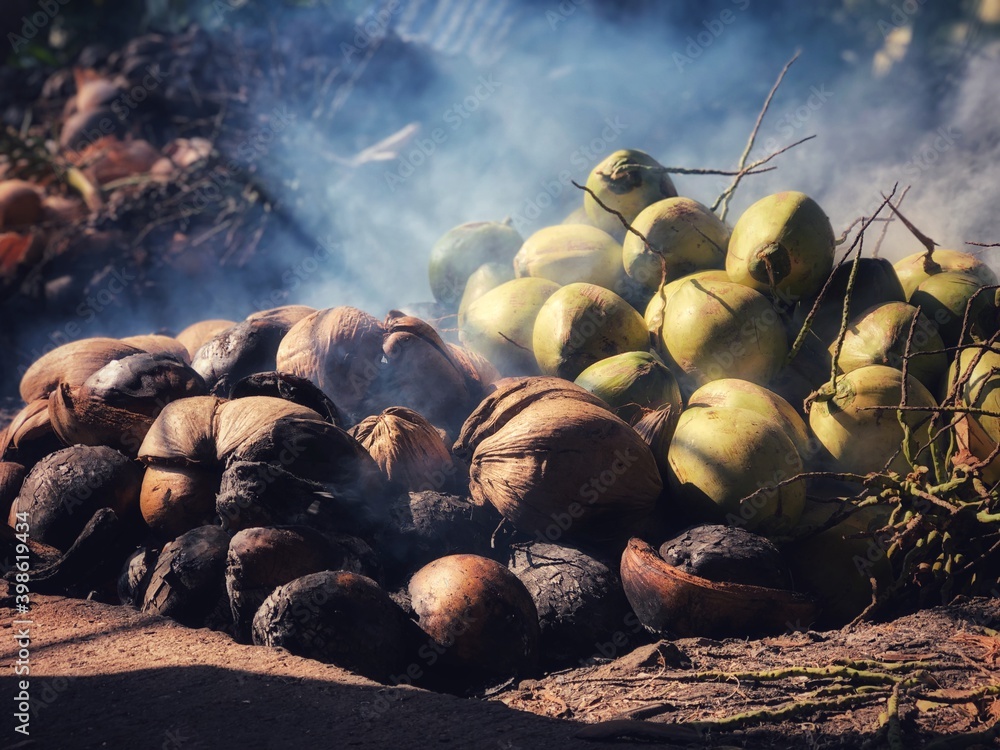 Coconut burning in Thailand to add aroma and special taste that is ...