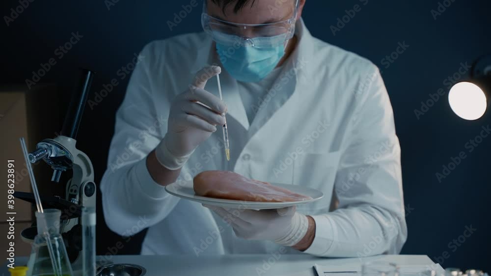 Genetically modified meat. GMO food concept. Genetic injection. Food ...