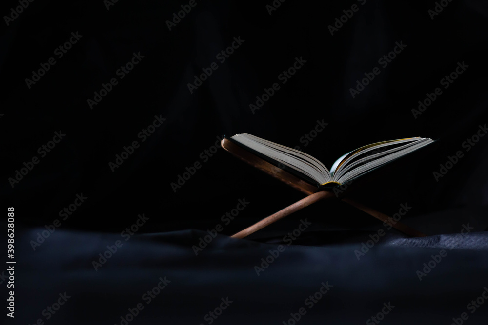 The Holy Quran in Mosque - Open to Read - Study the black background ...