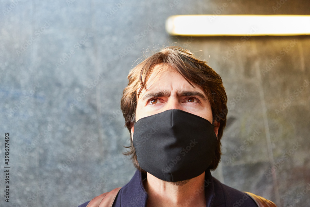 Man with face mask as prevention against coronavirus Stock Photo ...