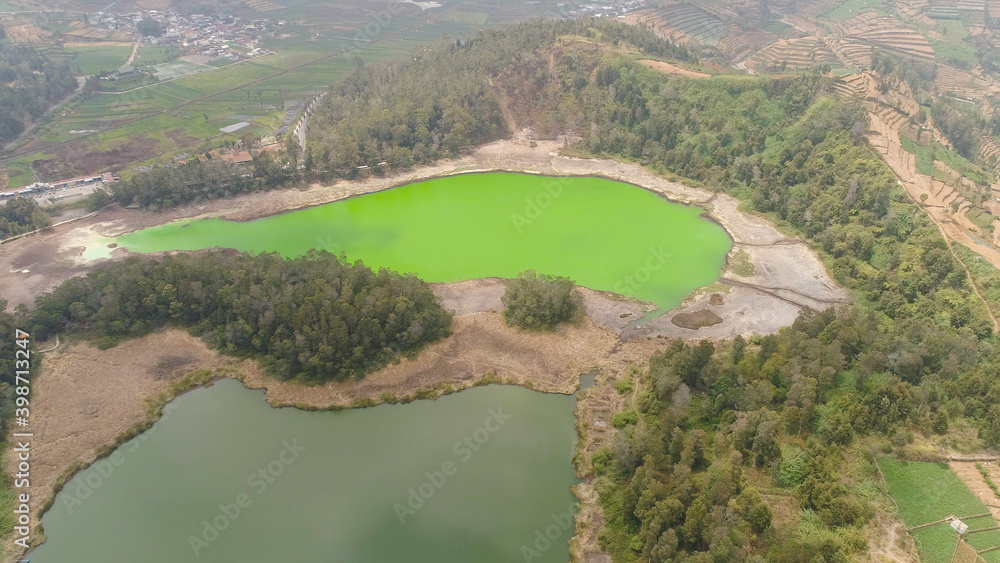 volcanic sulfur lake telaga warna in dieng plateau, java Indonesia ...