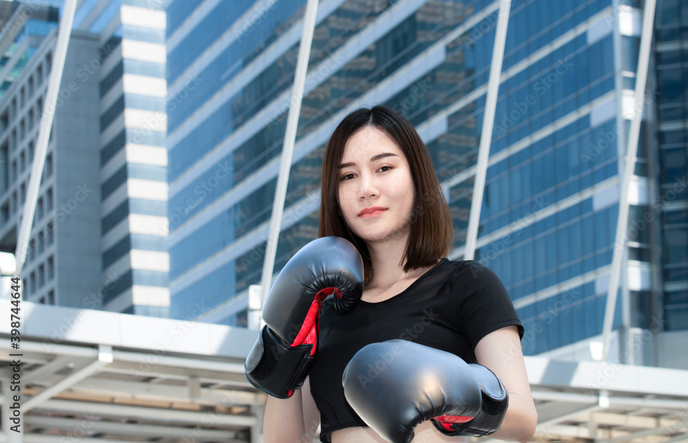 Asian beautiful boxer woman on building background. Boxing fitness ...