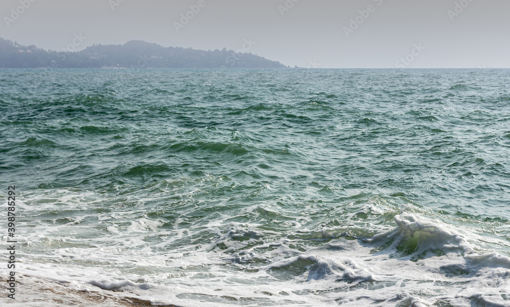 Foto de Rugged chaotic moving waved of ocean surface. Clouded extreme ...