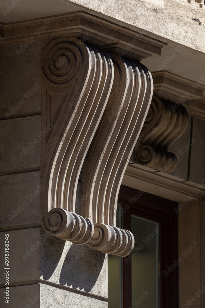 Elements of architectural decorations of buildings, a beam under the ...