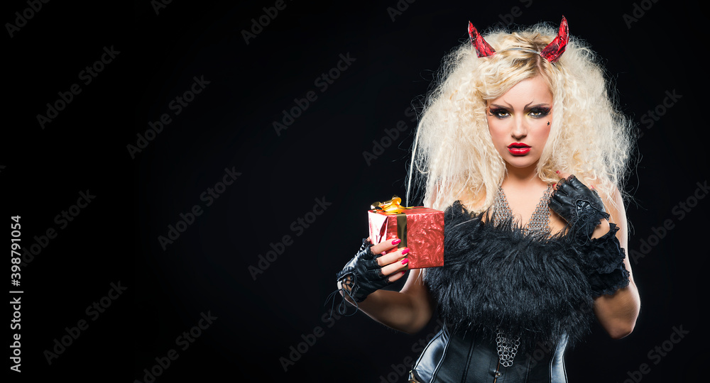 Beautiful Devil Girl offering Christmas present. Young Lucifer woman ...