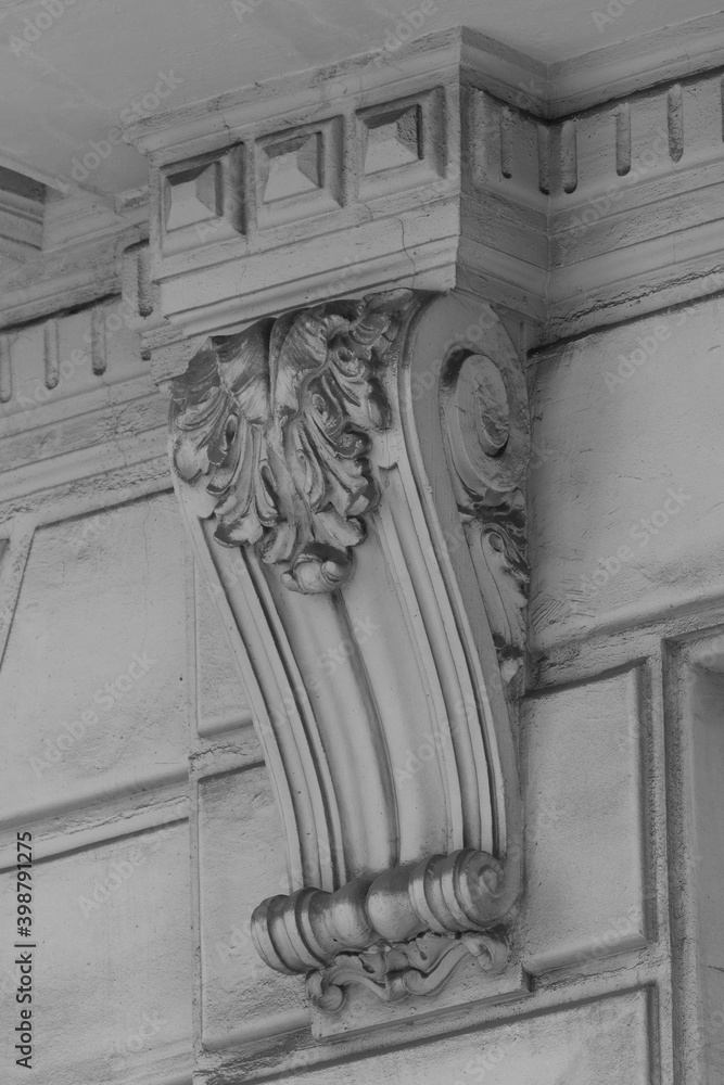 Elements of architectural decorations of buildings, a beam under the ...