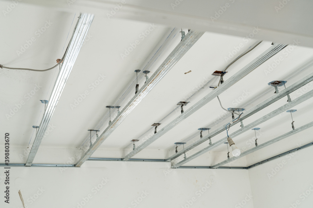 Suspended ceiling profiles for drywall construction in room renovation ...