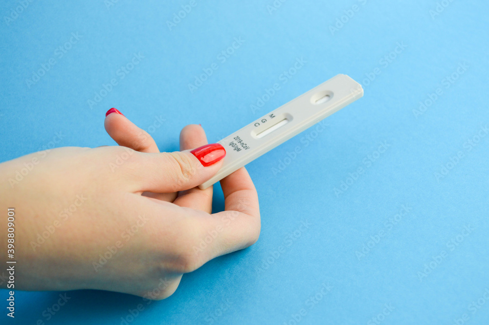 Positive test result by using rapid test for COVID-19, quick fast ...