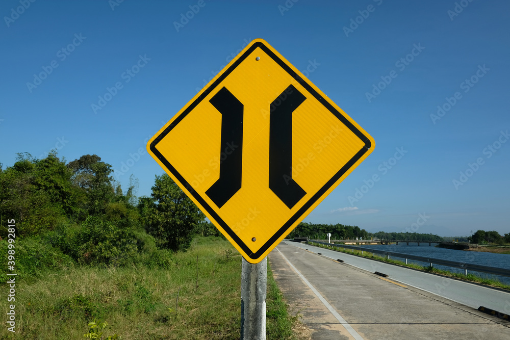 Yellow road signs, traffic signs Stock Photo | Adobe Stock