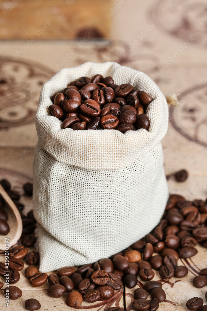 Jute sack full of coffee grains. Stock Photo | Adobe Stock